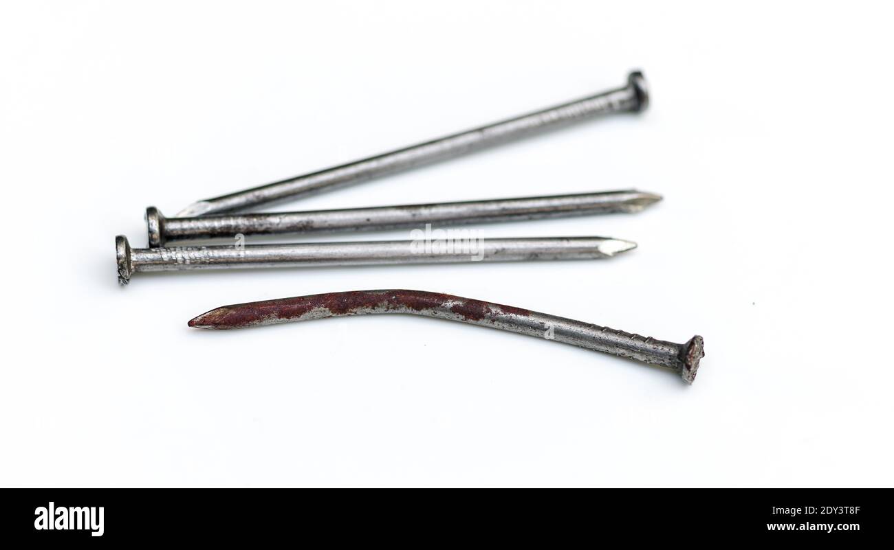 Four Iron Nails High Resolution Stock Photography and Images - Alamy