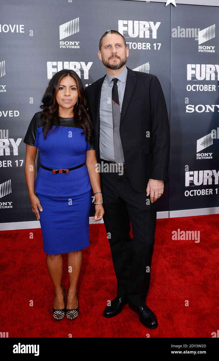 Director David Ayer and his wife attend the movie premiere of Fury at ...