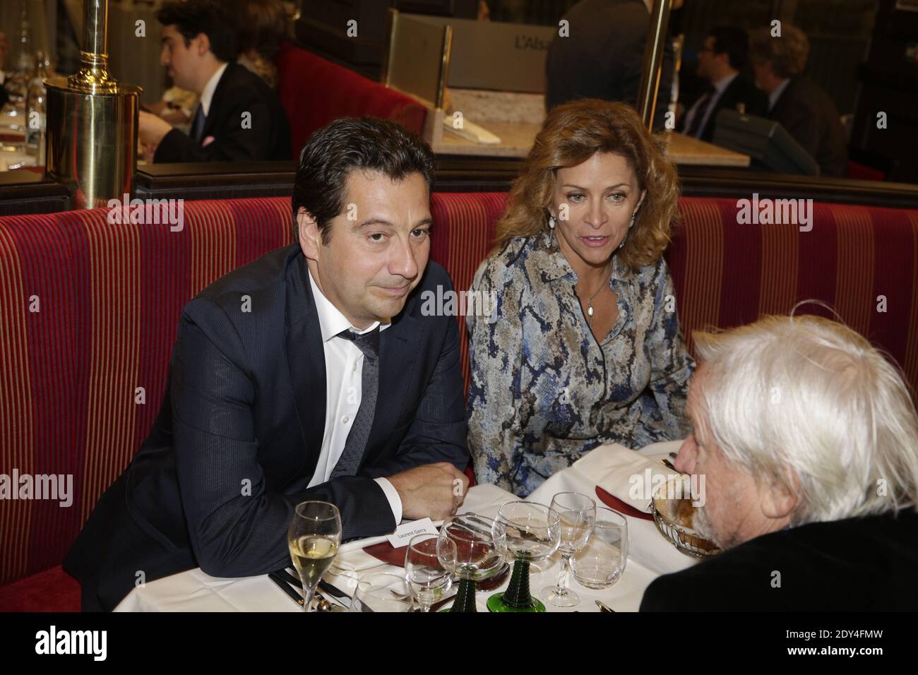 Exclusive - Laurent Gerra and Corinne touzet attending 'L'Alsace Champs-Elysees' restaurant ...