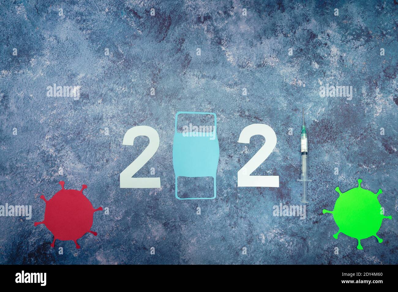 A shot of 2020-2021 with numbers, a face mask, covid symbols, and a ...