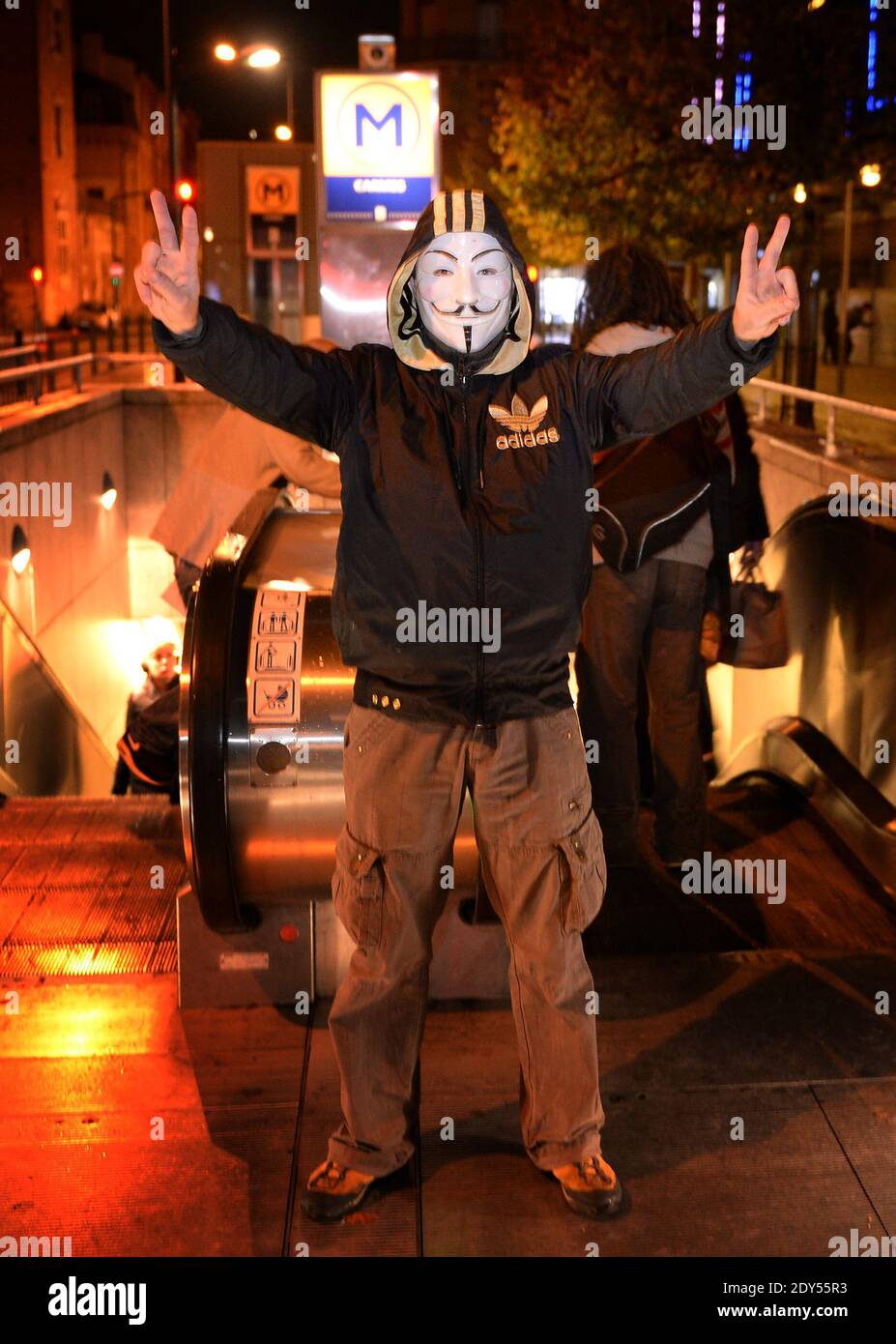 Masked protesters gather for the Million Mask March demonstration ...