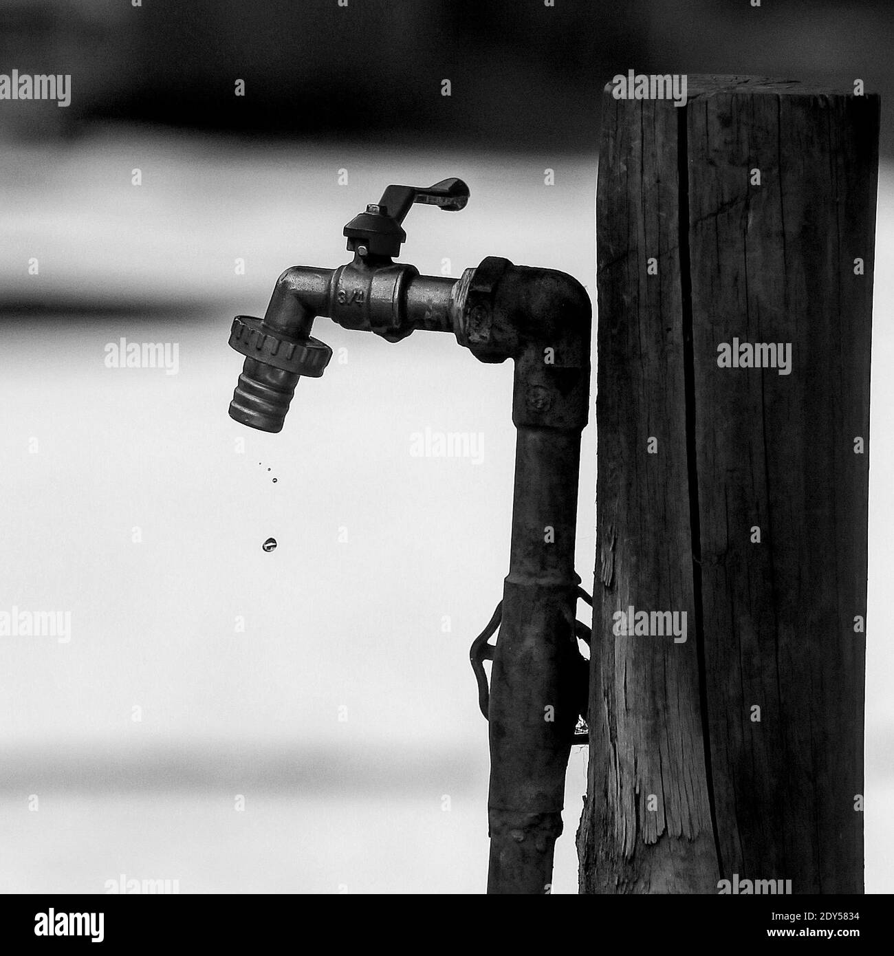 Water from the tap Black and White Stock Photos & Images - Alamy