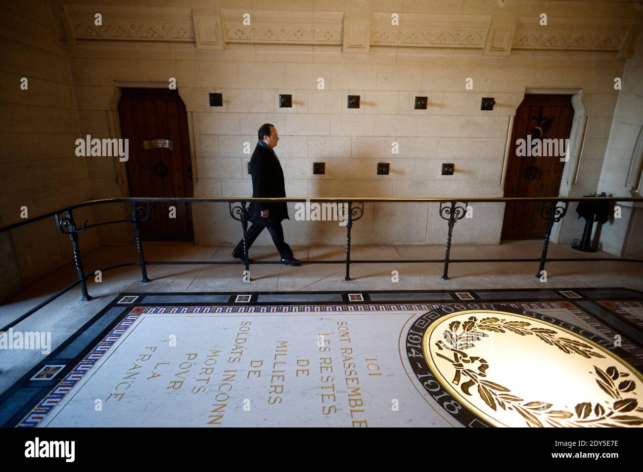 French President Francois Hollande arrives in the crypt of the Notre ...
