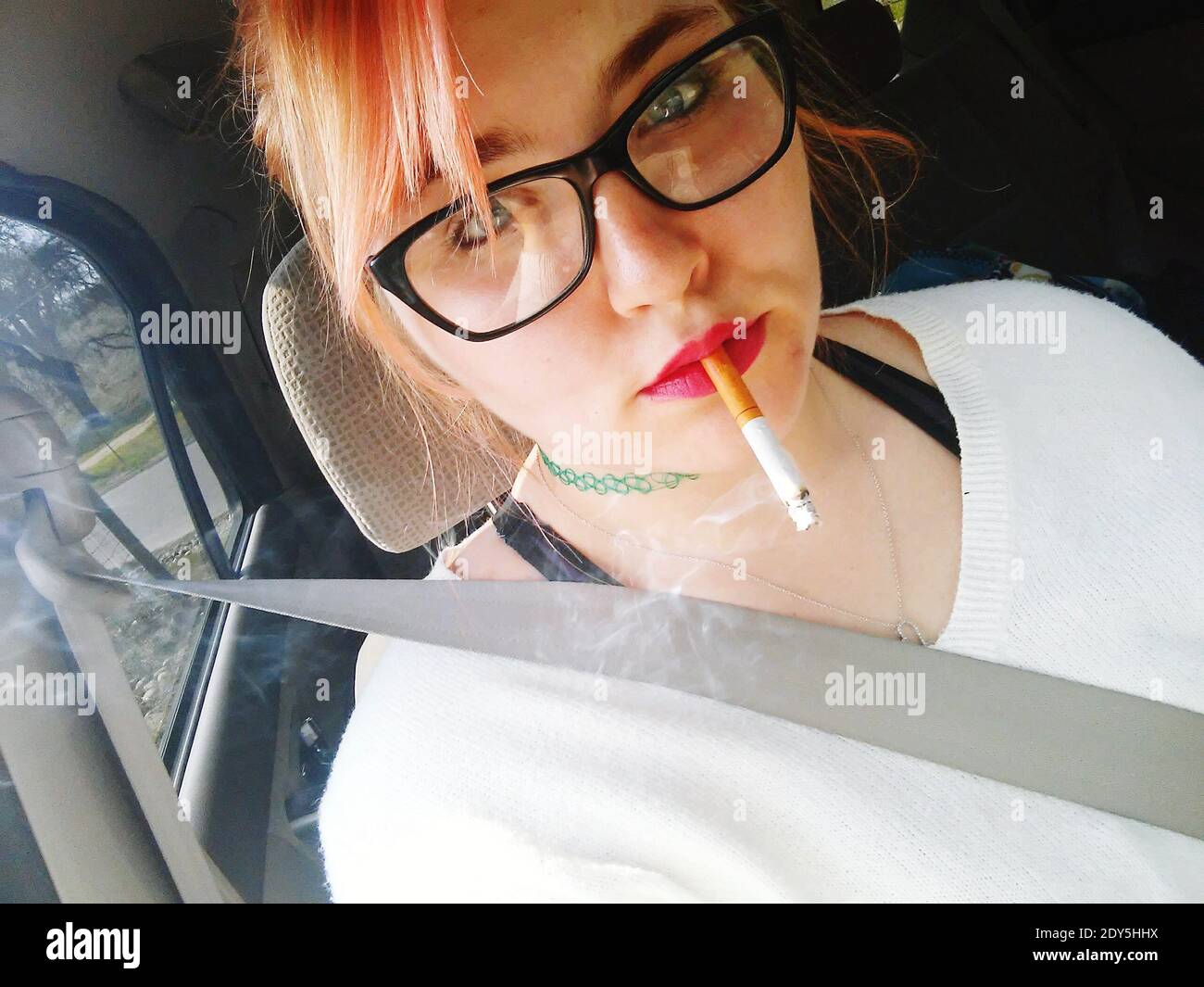 Smoking in car woman hi-res stock photography and images - Alamy