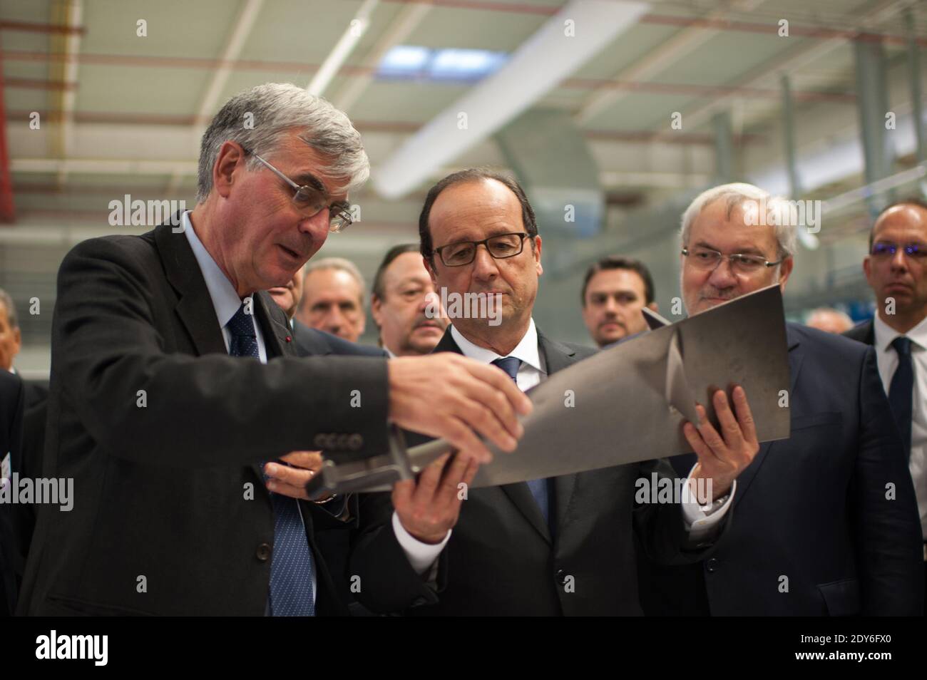 French President Francois Hollande listens to French Aerospace ...