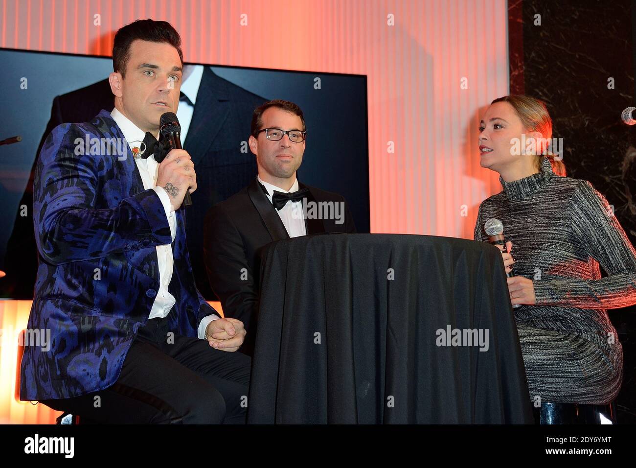 Robbie Williams, Raphael Gugerli and Sandrine Quetier attending a press ...