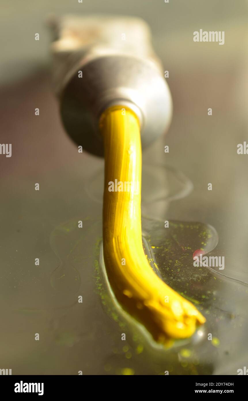 Squeeze paint out of the tube High Resolution Stock Photography and ...