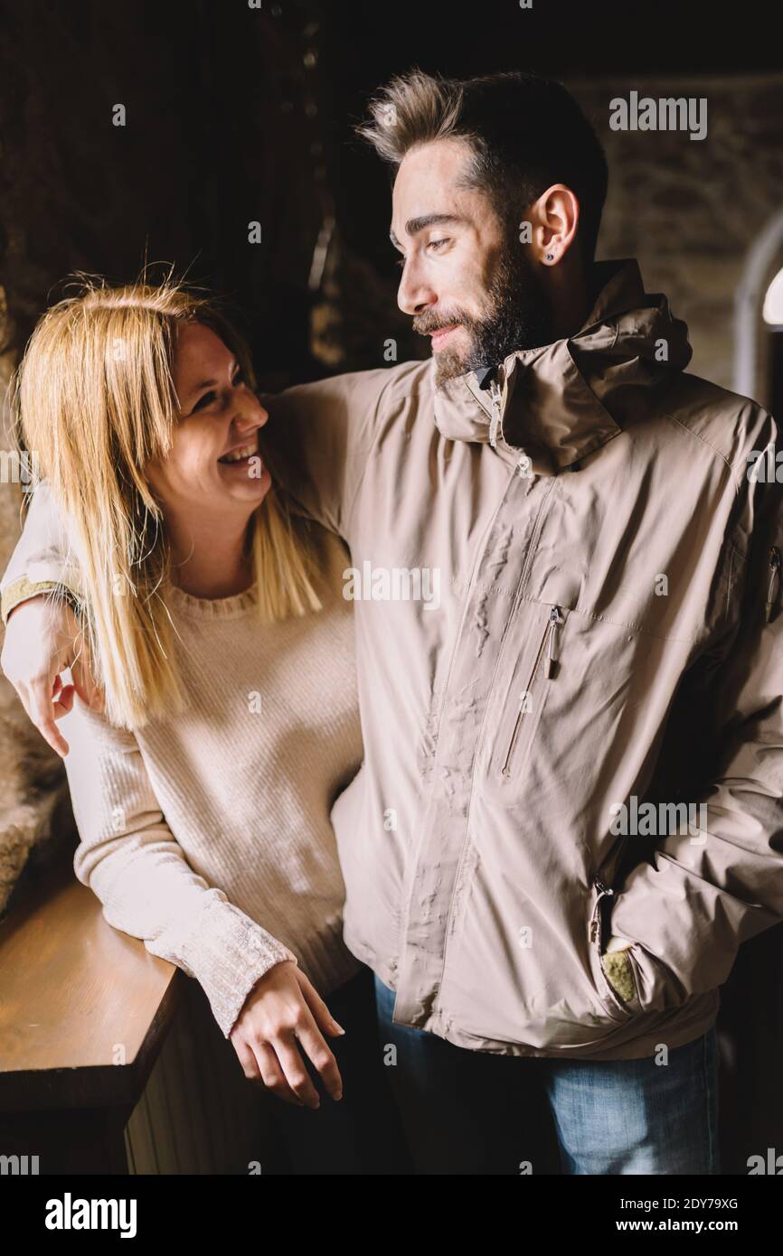 happy friends smiling laughing and looking each other Stock Photo - Alamy