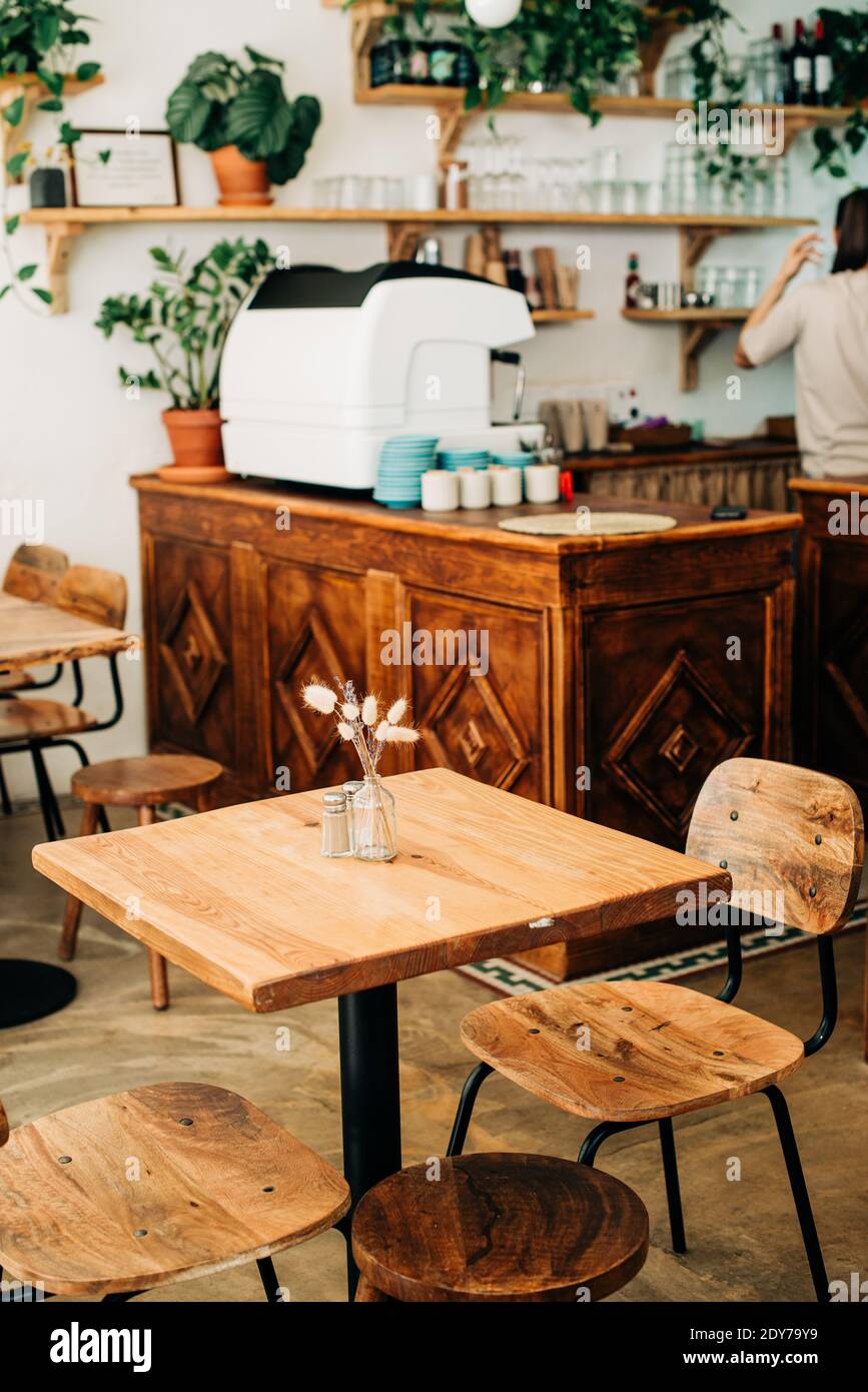 Cafe interior design, wooden table and vintage bar Stock Photo - Alamy