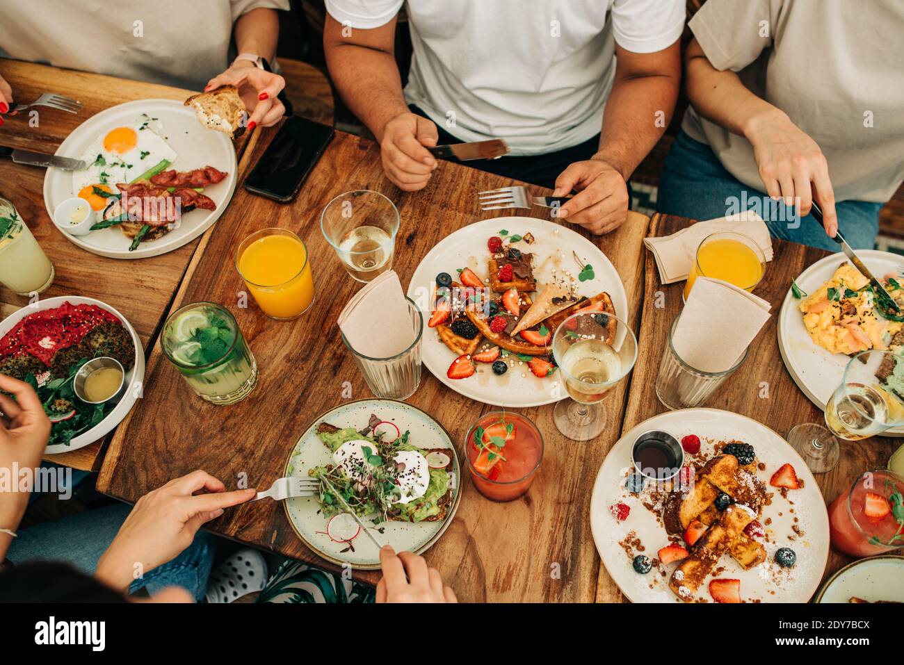 Group Of People Eating Breakfast