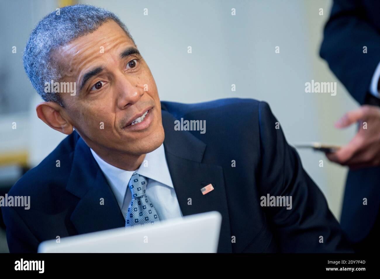 U.S. President Barack Obama talks to middle-school students who are ...