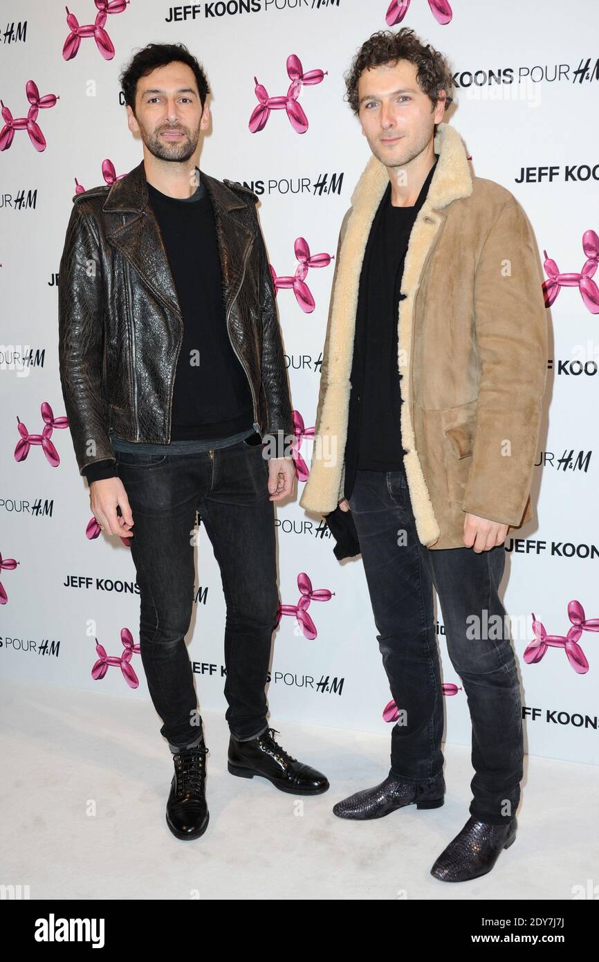 Simon Buret and Olivier Coursier attending the Jeff Koons for H&M party ...