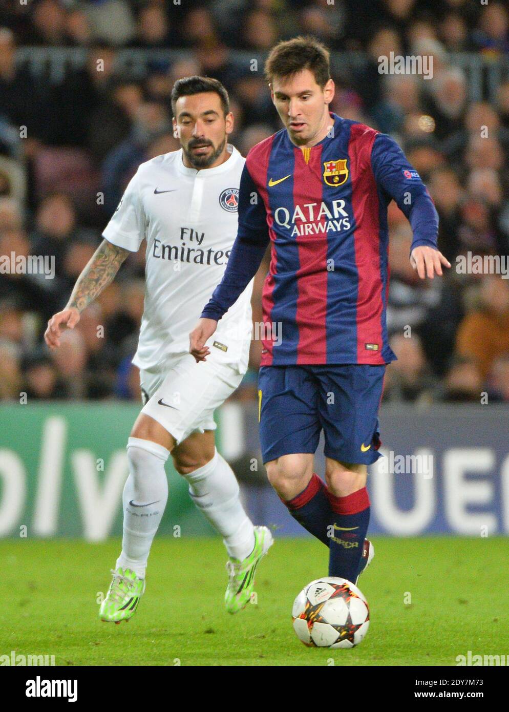 Barcelona's Lionel Messi and PSG's Ezequiel Lavezzi during the UEFA ...