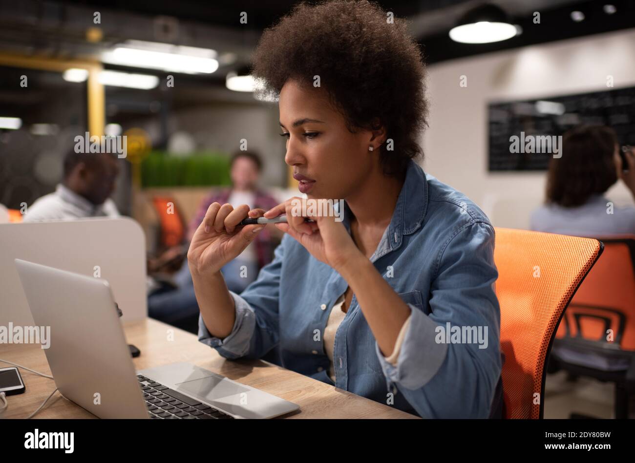 Computer screen reading ethnic hi-res stock photography and images - Alamy