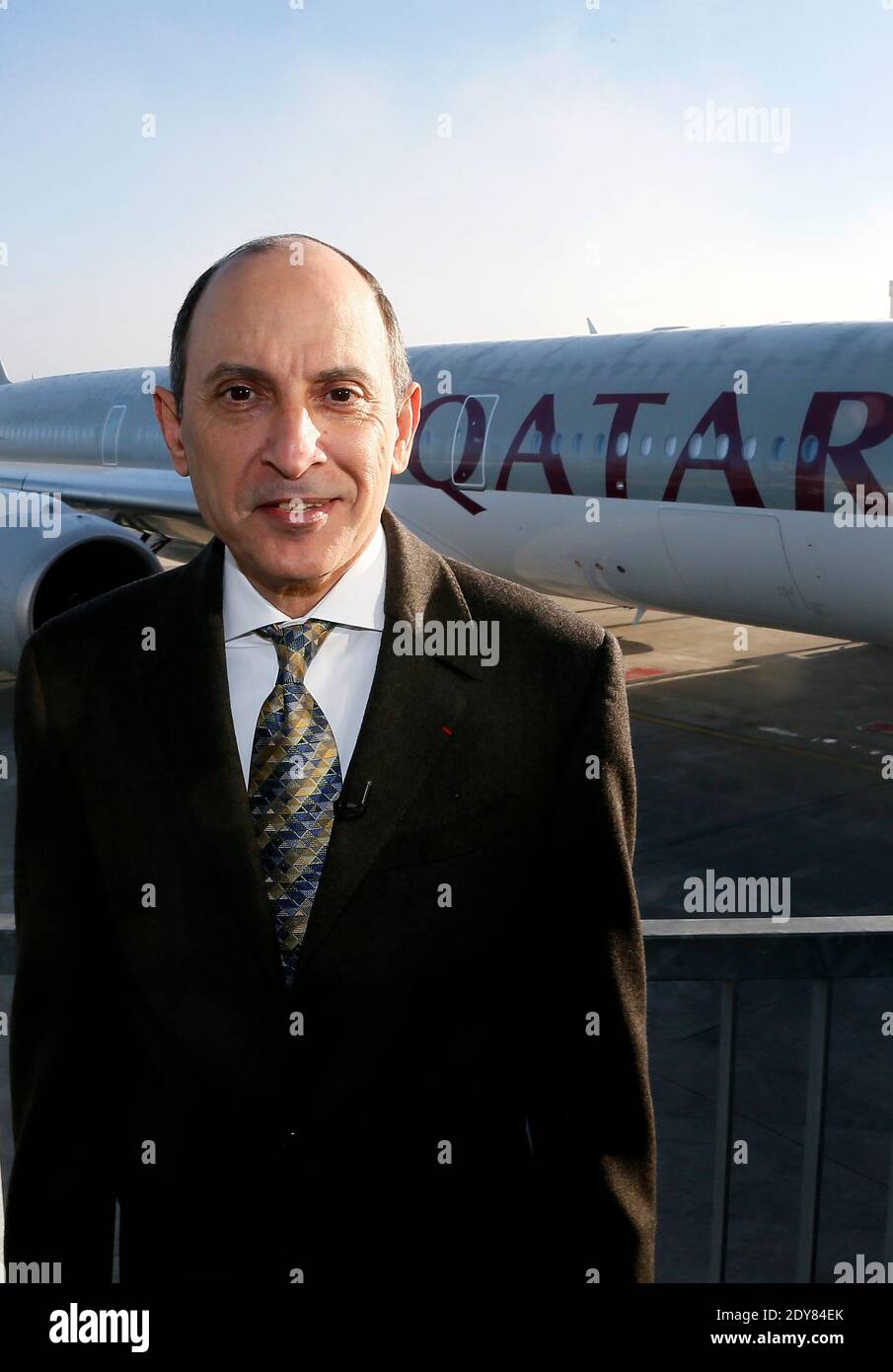 Qatar Airways CEO Akbar Al Baker poses near one of the two Airbus A350 ...