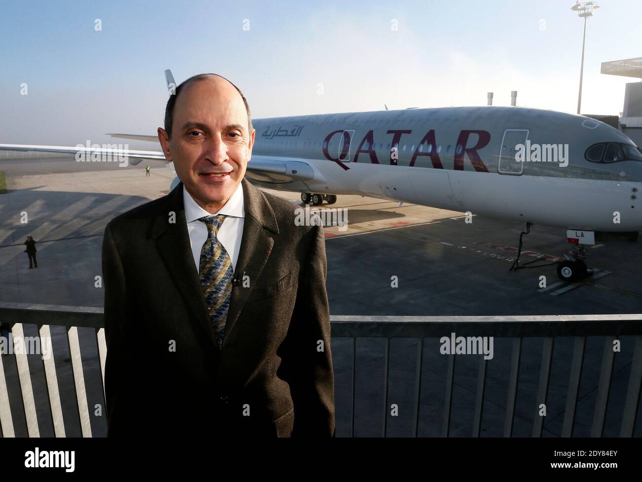 Qatar Airways CEO Akbar Al Baker poses near one of the two Airbus A350 ...
