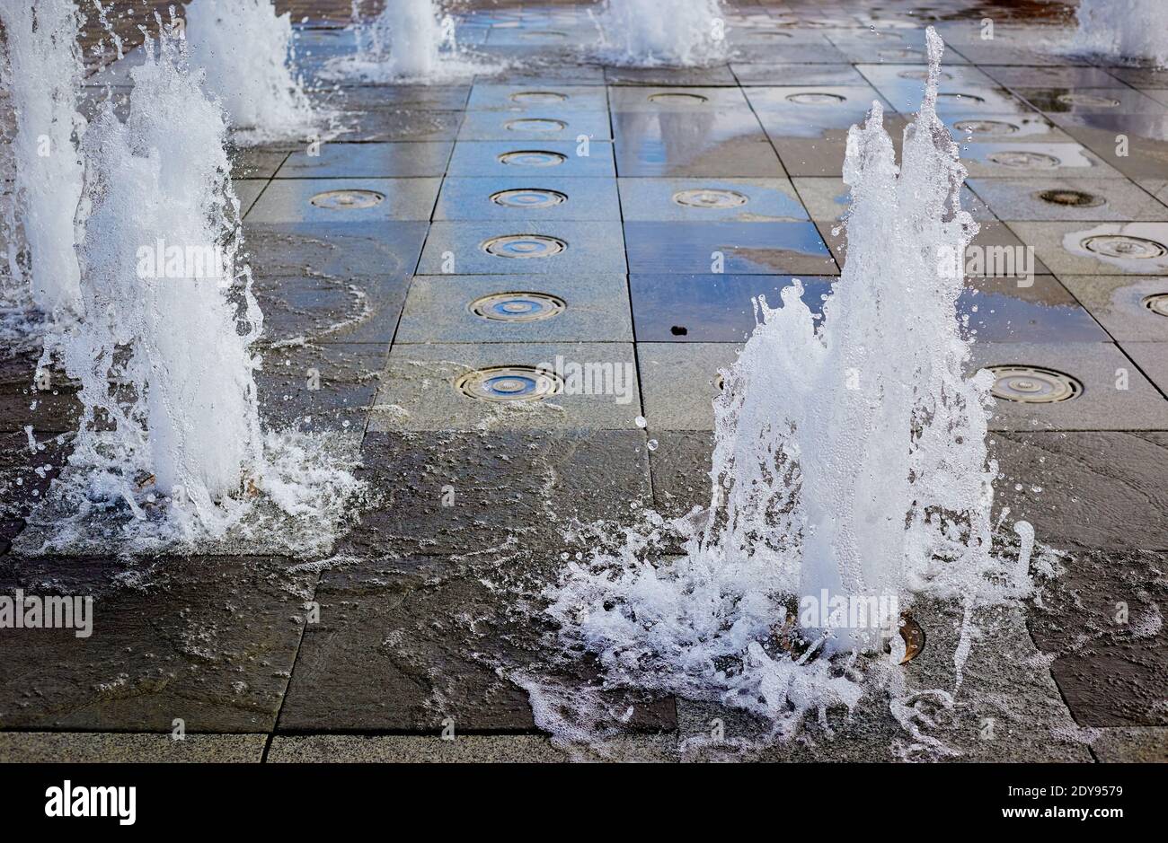 Water splashes in the city fountain close up Stock Photo - Alamy
