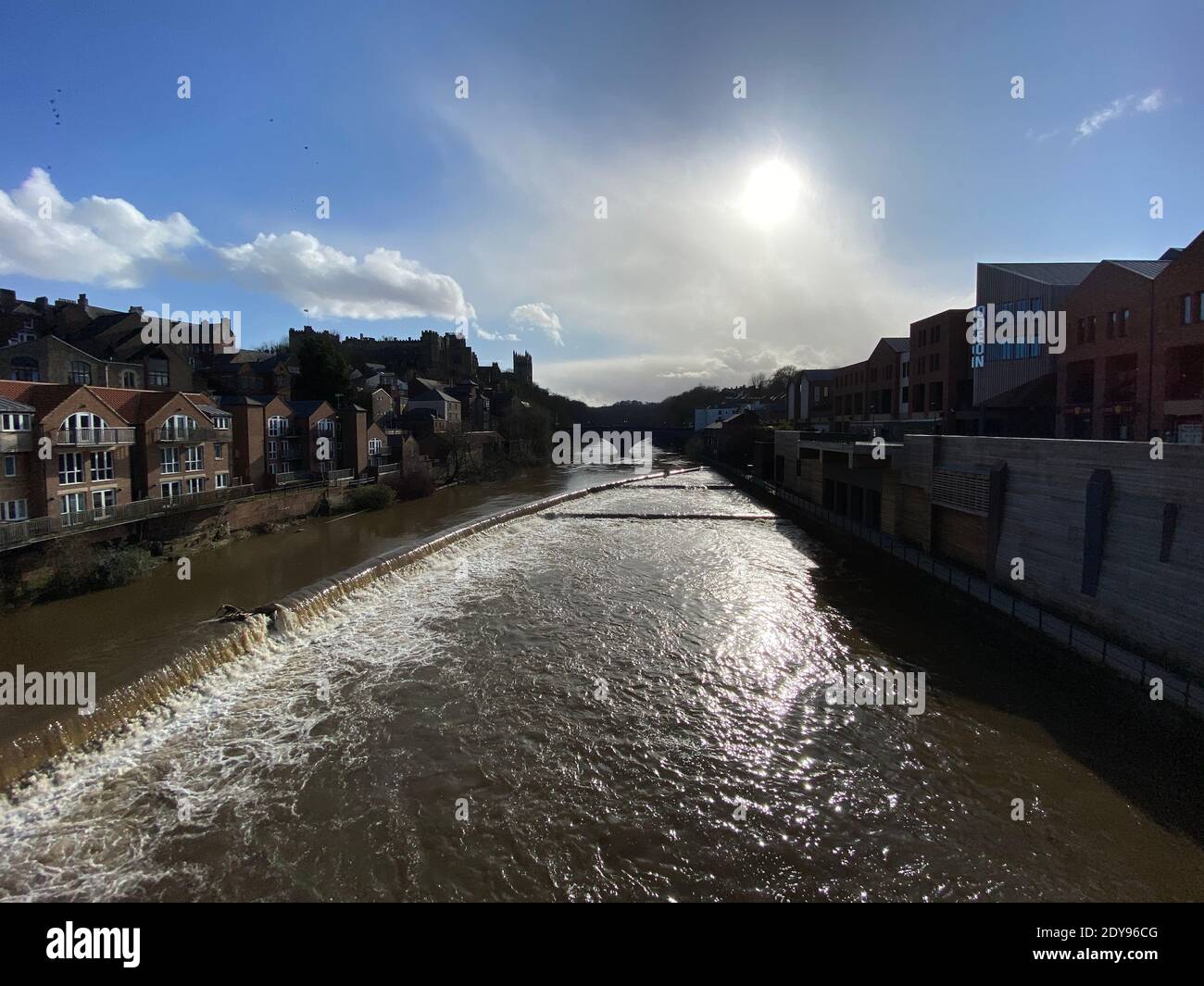 River Passing Through City Buildings Stock Photo - Alamy