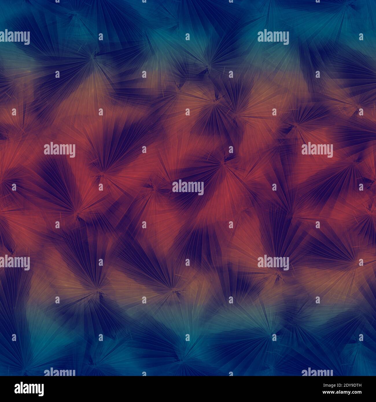 Tropical blue foliage on ombre sunset gradient Stock Photo - Alamy