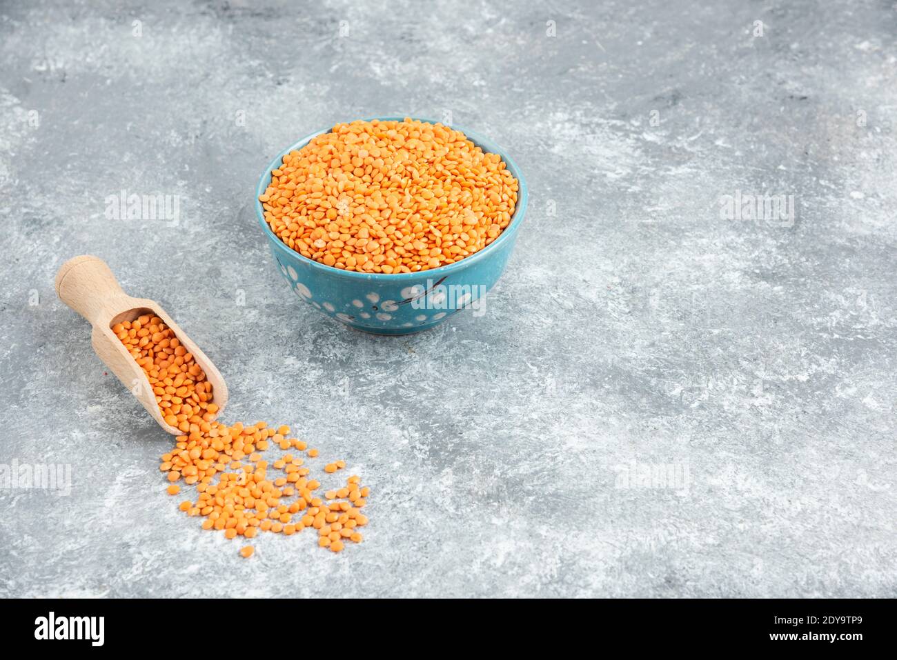 Red lentils spoon in hi-res stock photography and images - Alamy