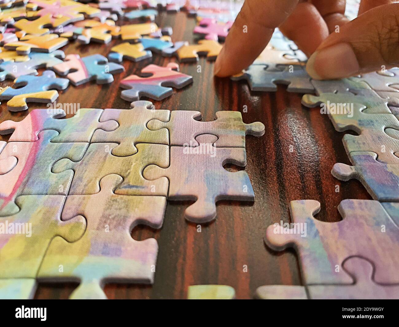 Puzzles That Have Not Yet Been Completed Horizontally Stock Photo - Alamy