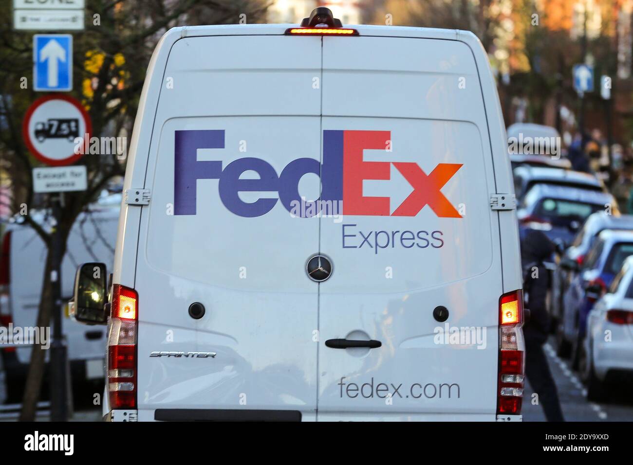 London, UK. 24th Dec, 2020. A FedEx delivery van seen parked on the ...