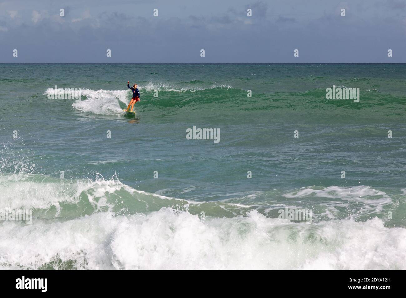 Teen surfing water wave hi-res stock photography and images - Alamy
