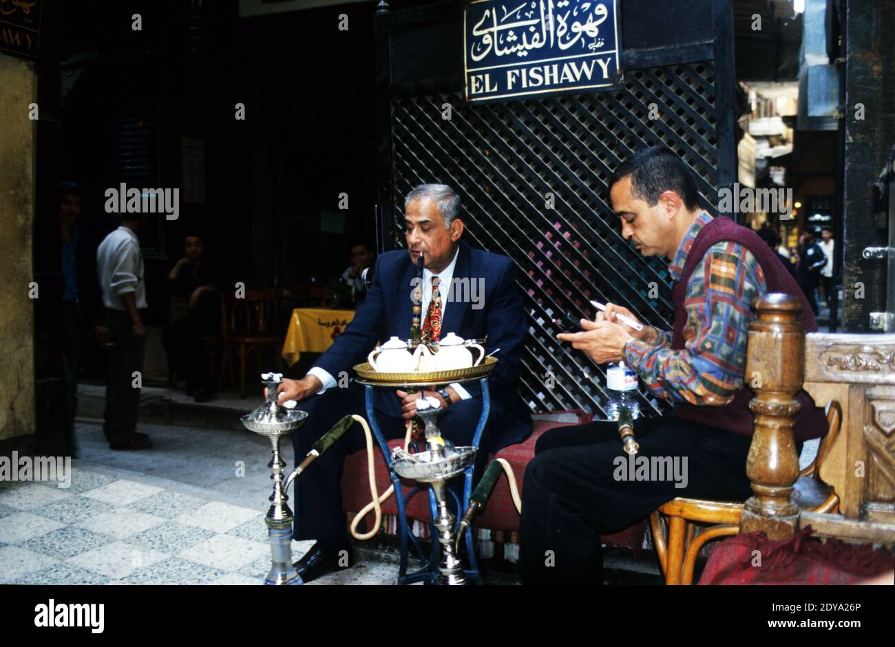 Egyptian men sitting at the El Fishawy cafe in Khan el-Khalili market ...