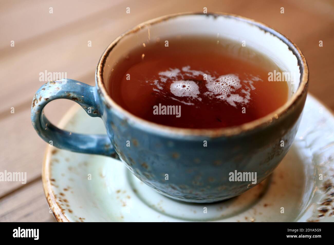 Details of tea cup on in cafe Stock Photo - Alamy