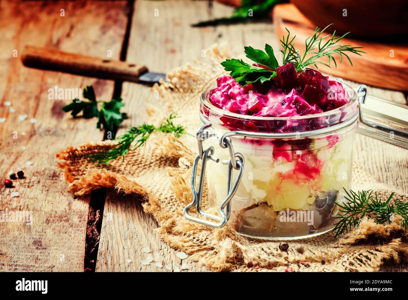 Russian Salad With Salted Herring And Beetroot, Old Wooden Background ...