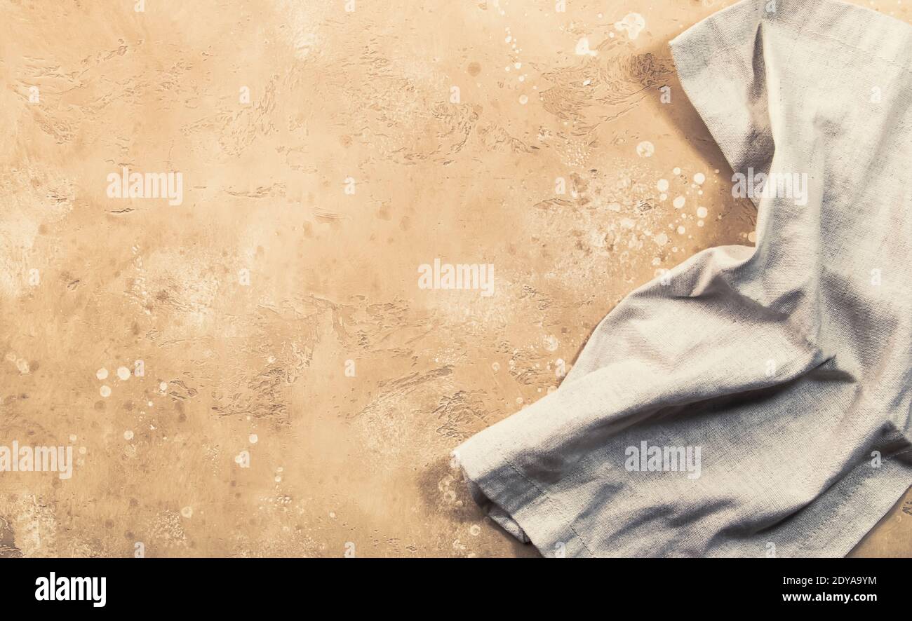 Gray KitchenTable cloth on beige table, top view and copy space ...