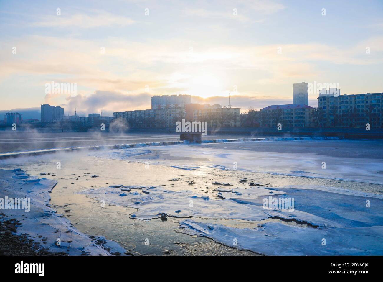 Winter scenery of the frozen Hun River in Baishan city, northeast China ...