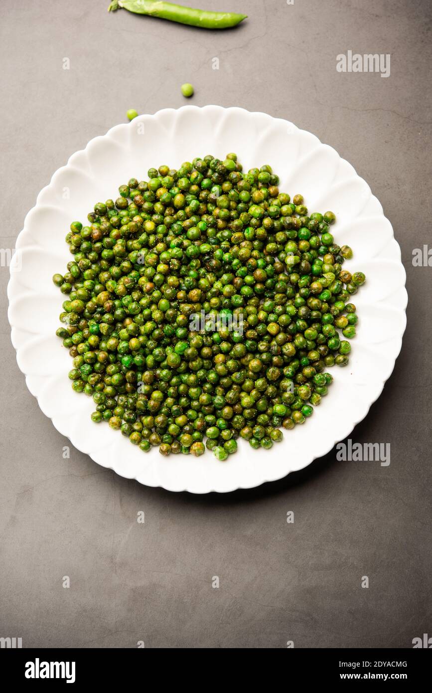 green spicy peas fried or roasted namkeen, dry snacks or chakna ...