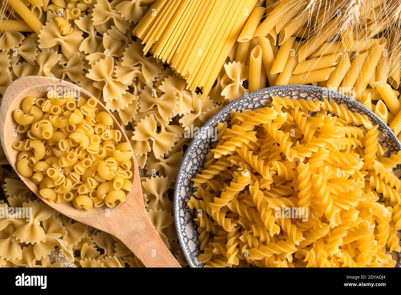 The table is covered with pasta of different varieties Stock Photo - Alamy