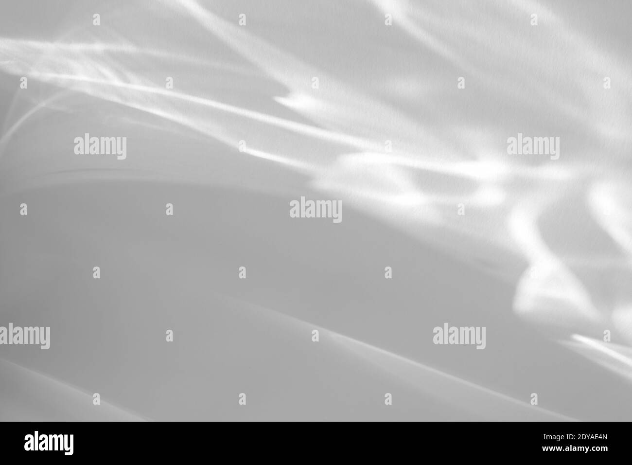 shadow and light caustic effect on a white wall Stock Photo - Alamy