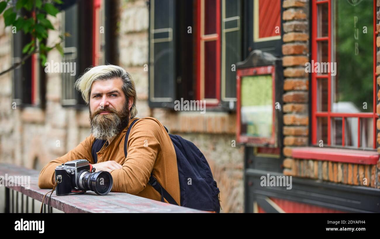 Handheld shooting. man photographer do shooting session. Shooting day ...