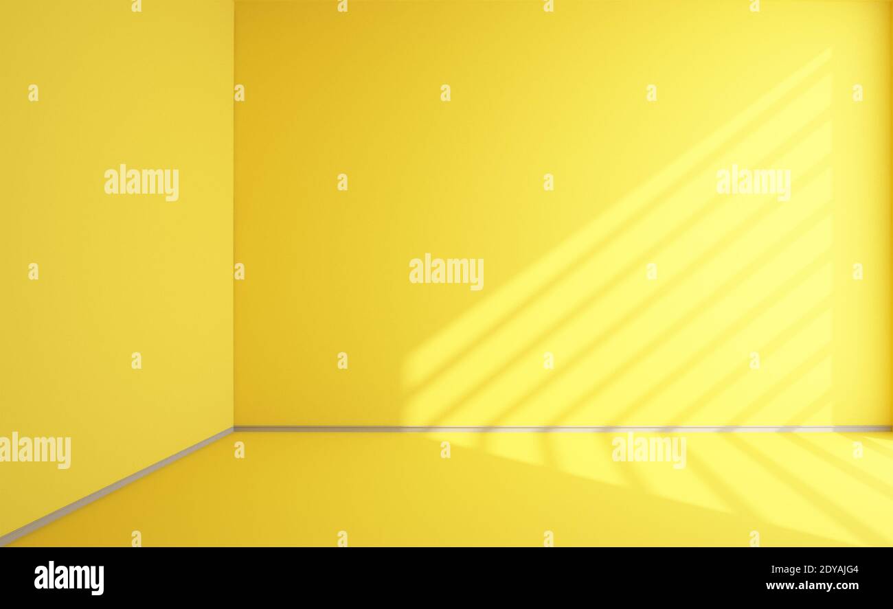 Empty yellow room with light from a window with shadows from blinds ...
