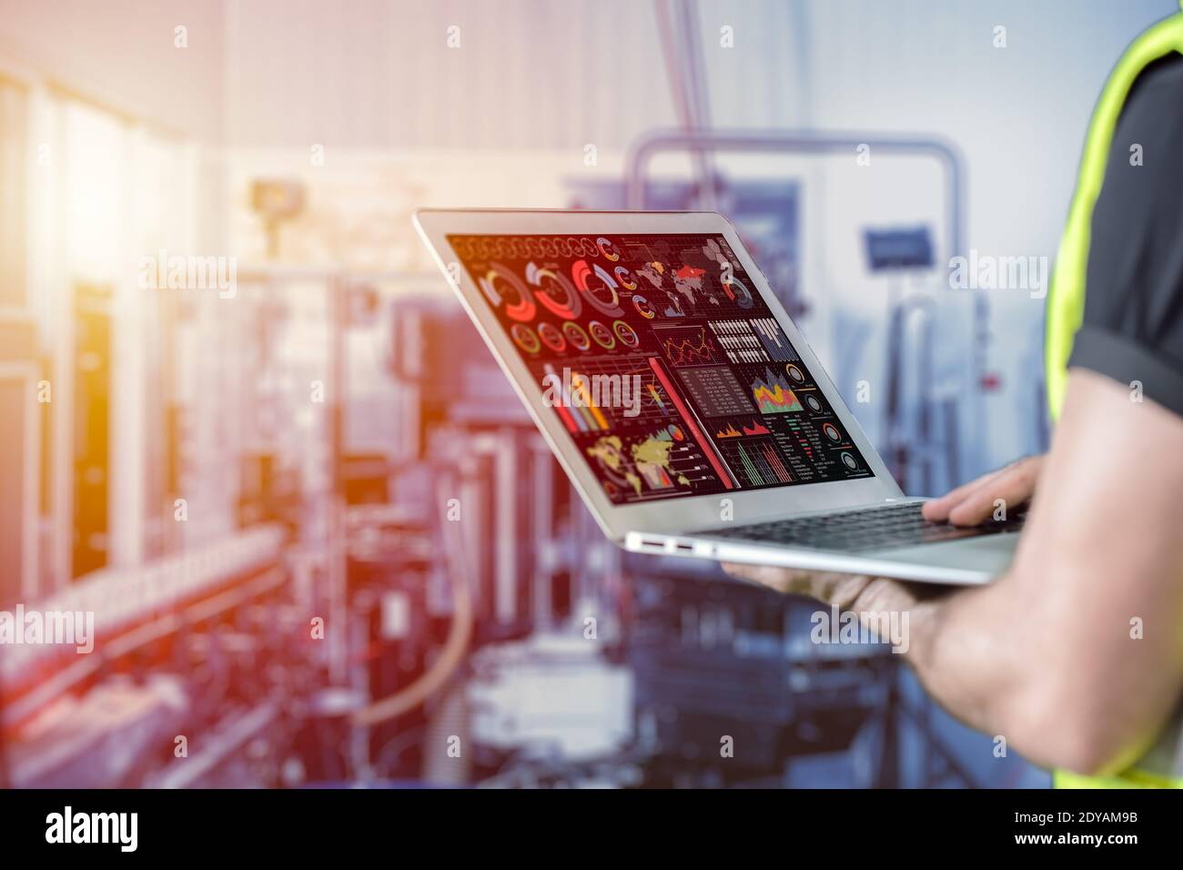 closeup engineer using laptop computer to monitor and checking business ...