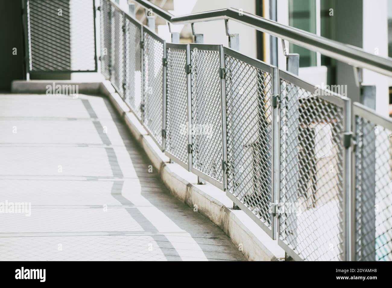 Sidewalks footpath with metal fences and stainless steel handles for ...