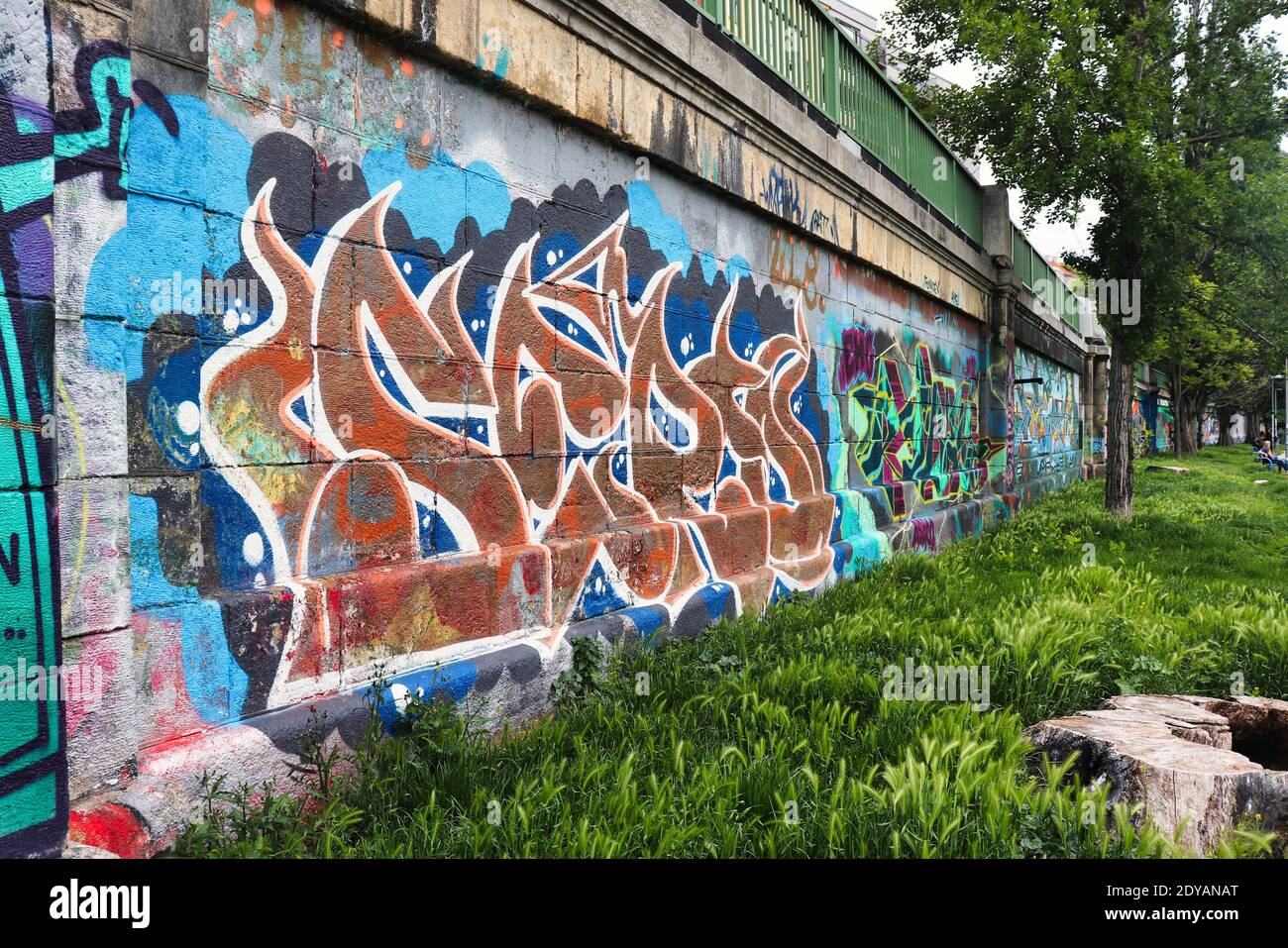 Graffiti on a wall next to the Danube river in Vienna, Austria Stock ...