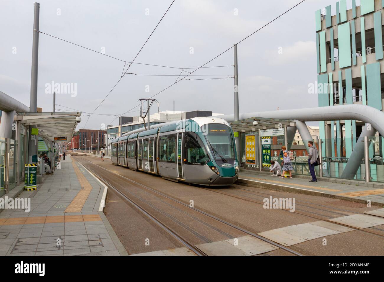 A Nottingham Express Transit (NET) tram arriving at Nottingham Station ...