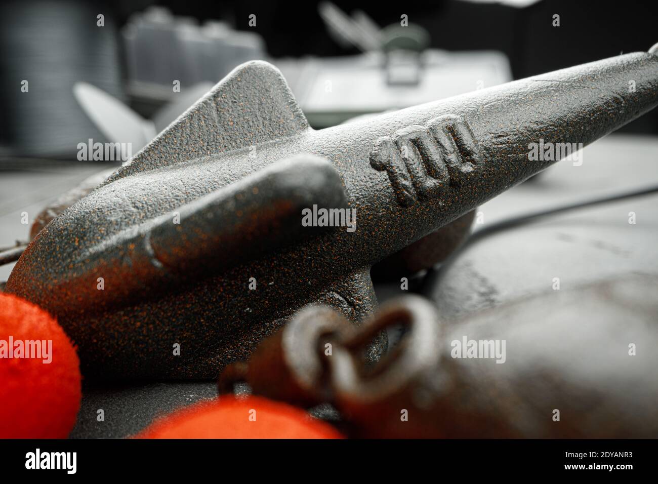 Lead weight for fishing close up photo Stock Photo - Alamy