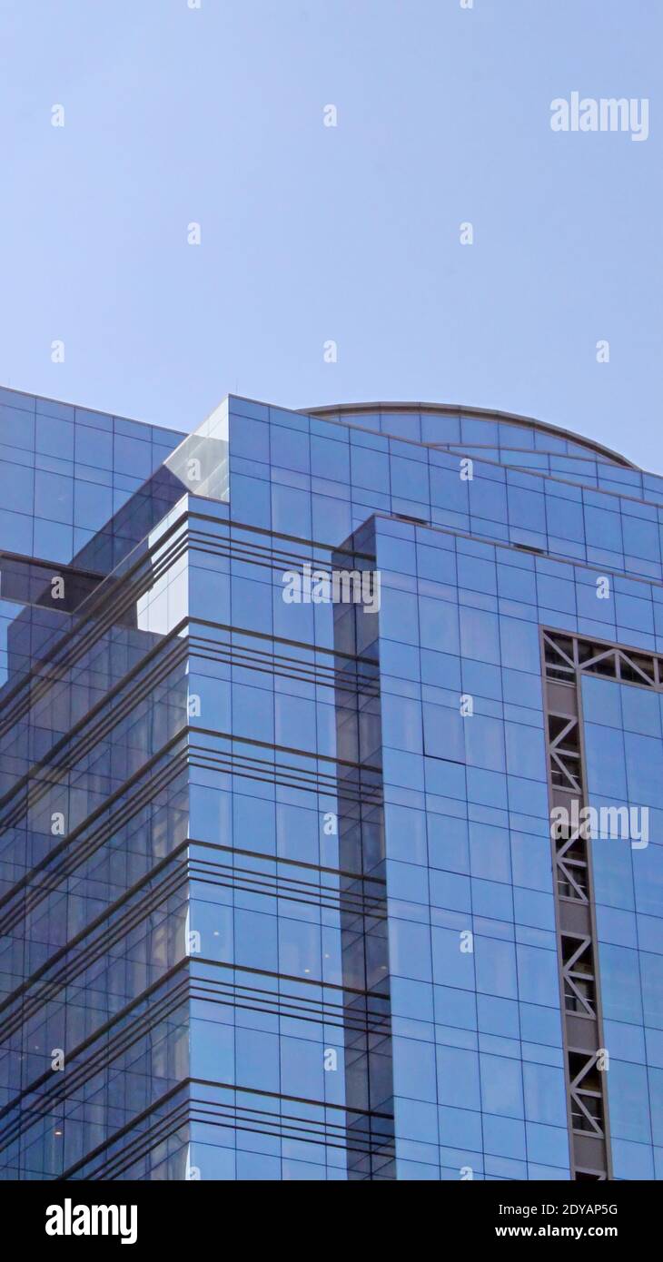Blue glass modern business center Stock Photo - Alamy