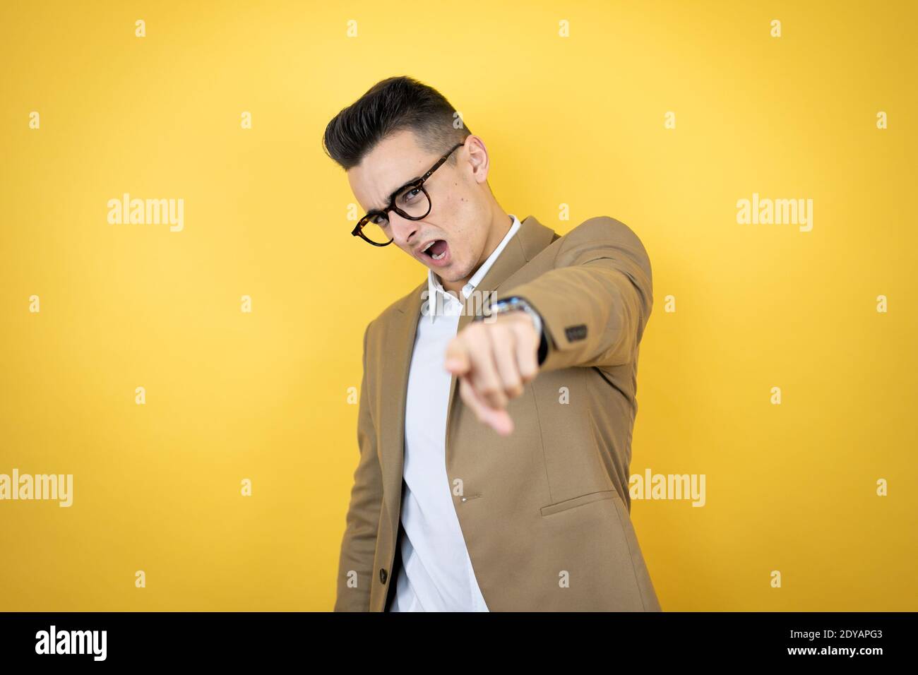 Funny boy pointing finger over hi-res stock photography and images - Alamy
