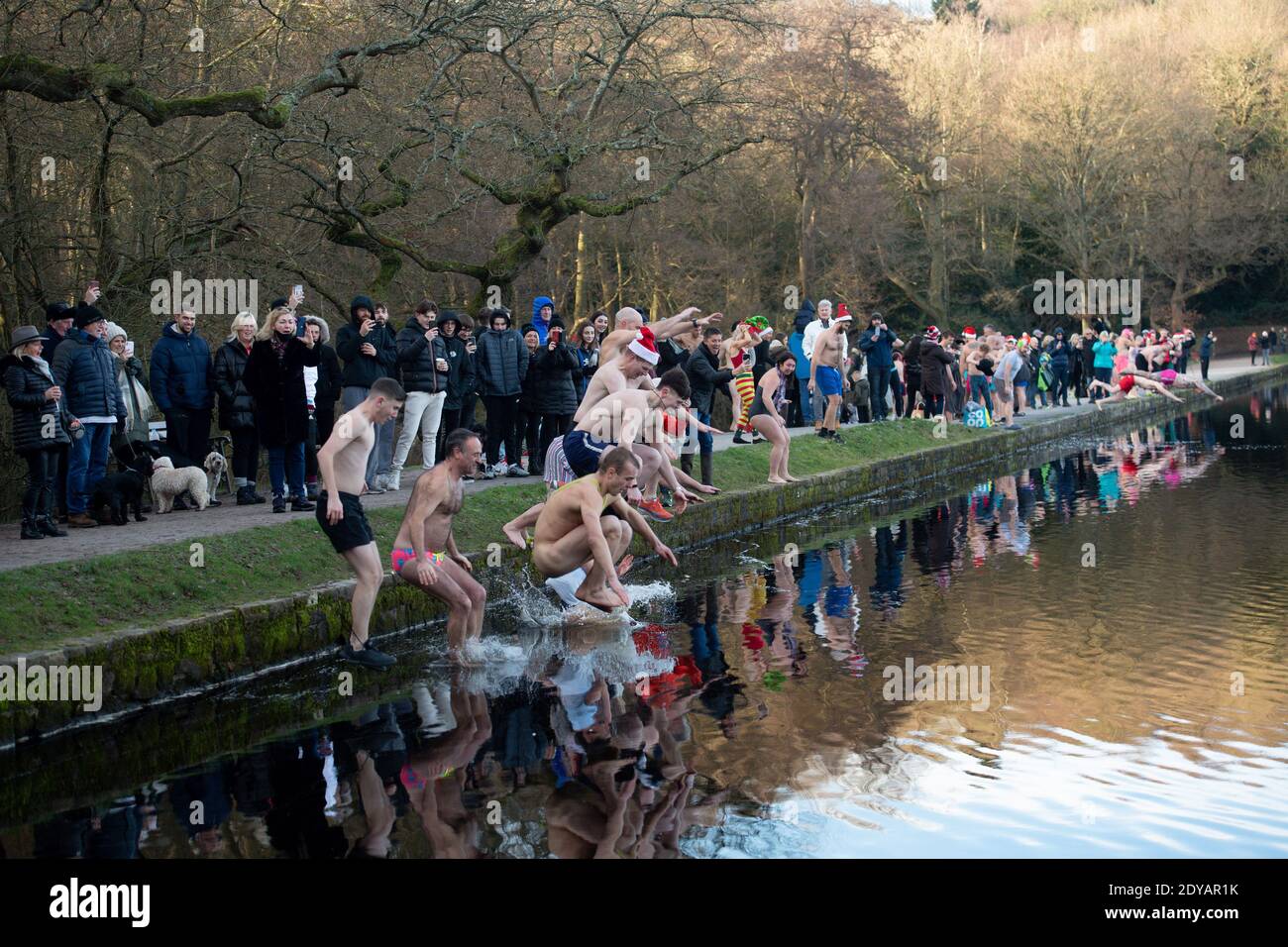 Swimmers take a Christmas Day dip at Blackroot Pool at Sutton Park, in ...