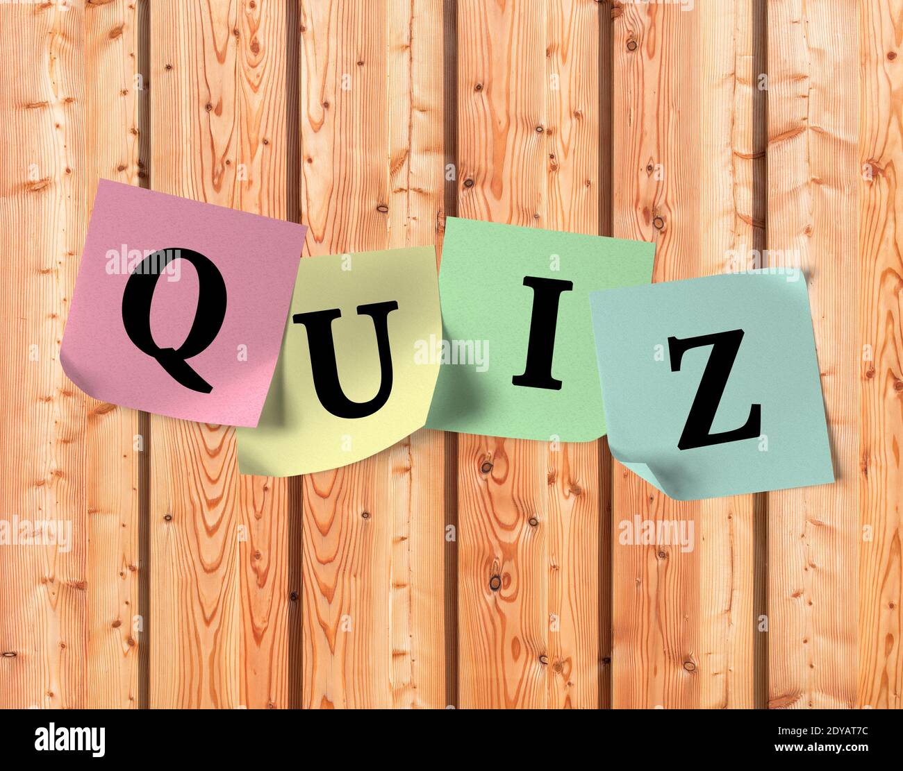 Sticky notes with the word Quiz on a wooden wall Stock Photo - Alamy