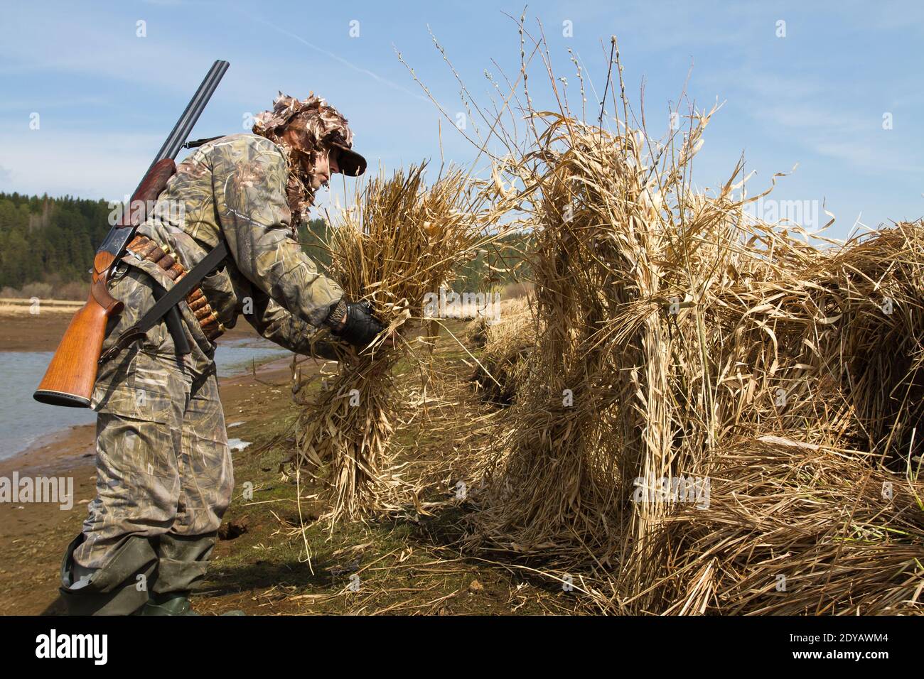 Man with shotgun and mask hi-res stock photography and images - Alamy