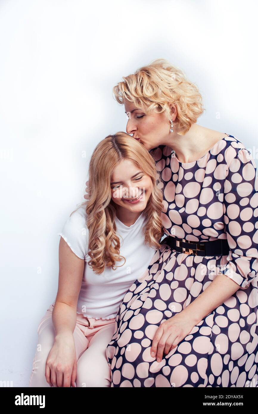 mother with teen daughter together posing happy smiling isolated on ...