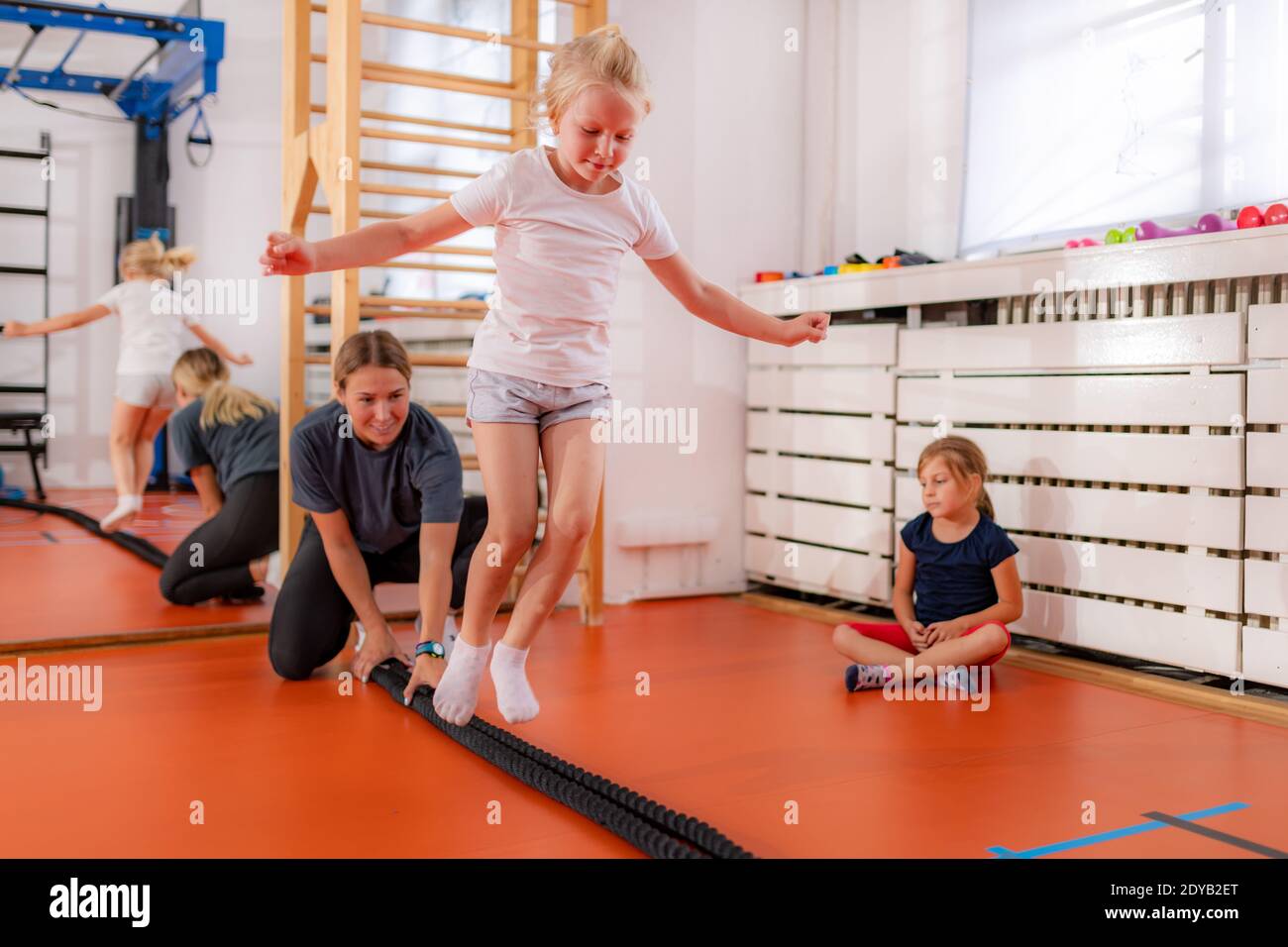 Gym teacher in school gymnasium hi-res stock photography and images - Alamy