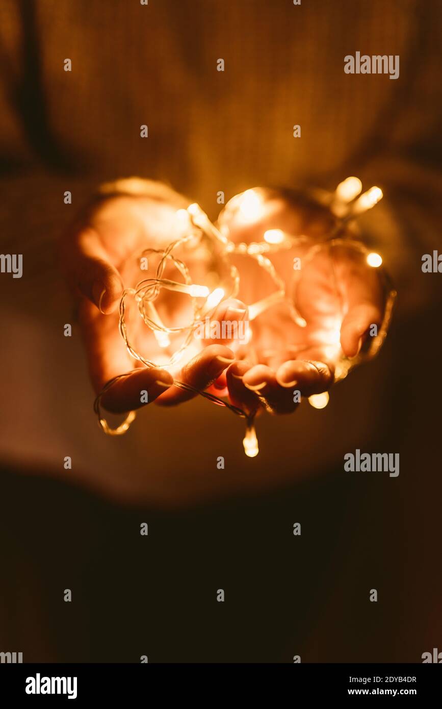 Holding glowing light ethereal hi-res stock photography and images - Alamy